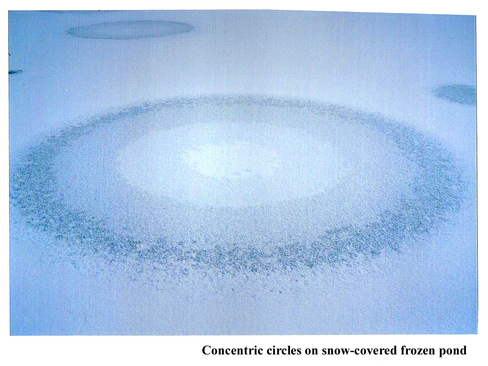 Snow on a Freshly Frozen Pond